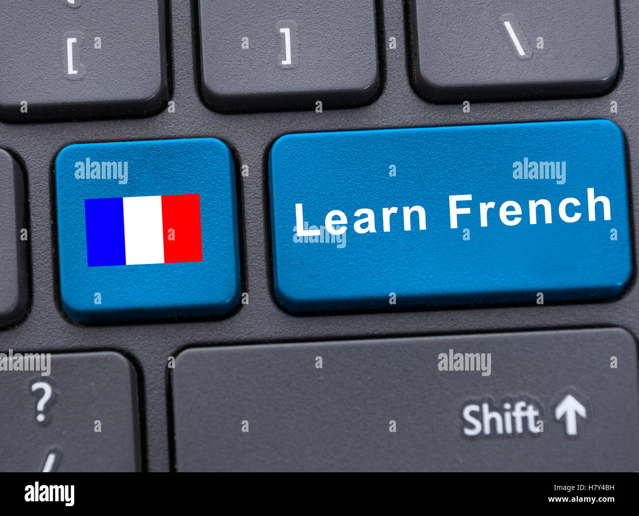 Button with learn french text as education concept Stock Photo - Alamy