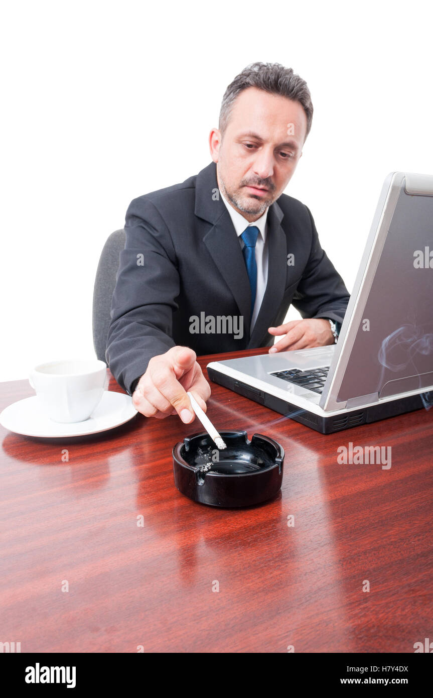 Man wearing suit and smoking at office isolated on white background ...