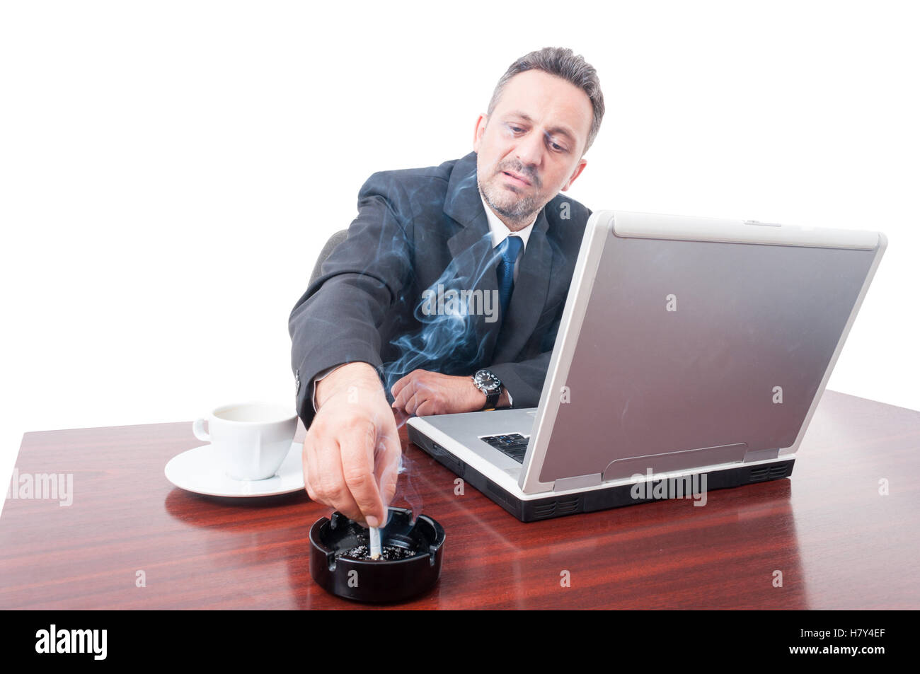 Man at office wearing suit smoking cigarette indoor isolated on white ...