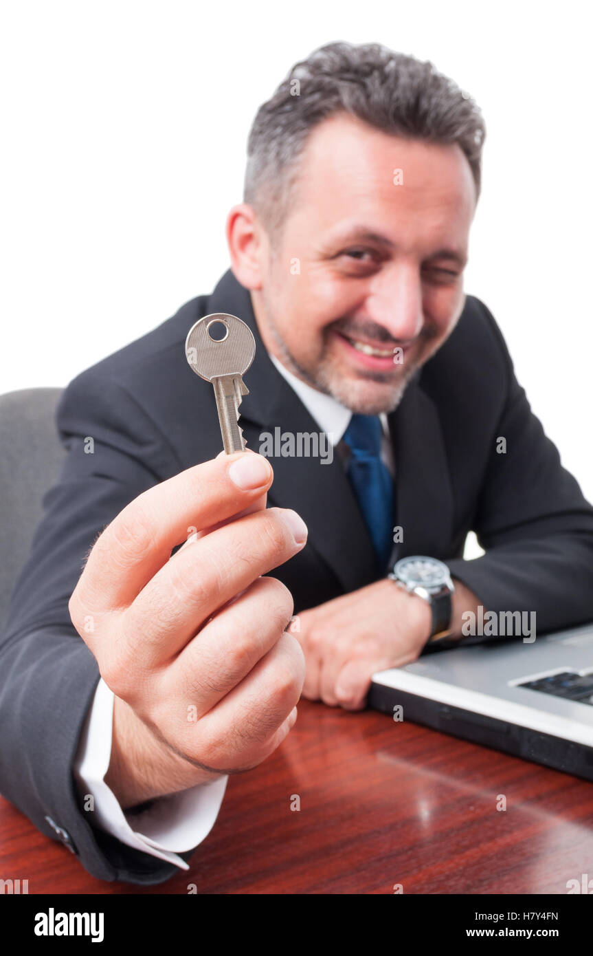 Happy salesman holding key hi-res stock photography and images - Alamy