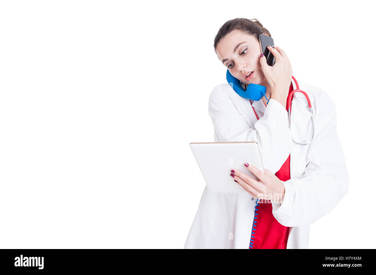 Female doctor multitasking hi-res stock photography and images - Alamy