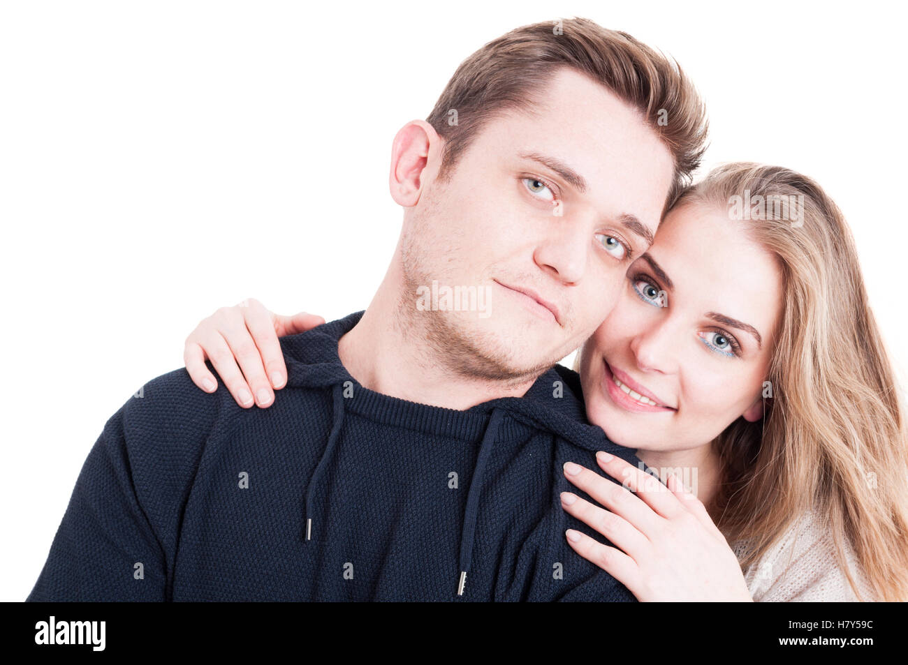 Happy couple posing and being affective with each other isolated on ...