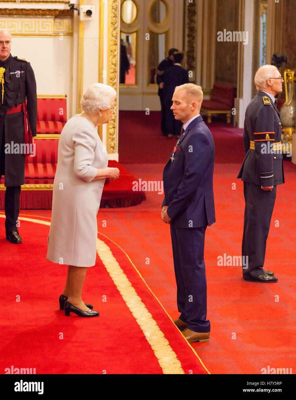 Is made an mbe by the queen at buckingham palace hi-res stock ...