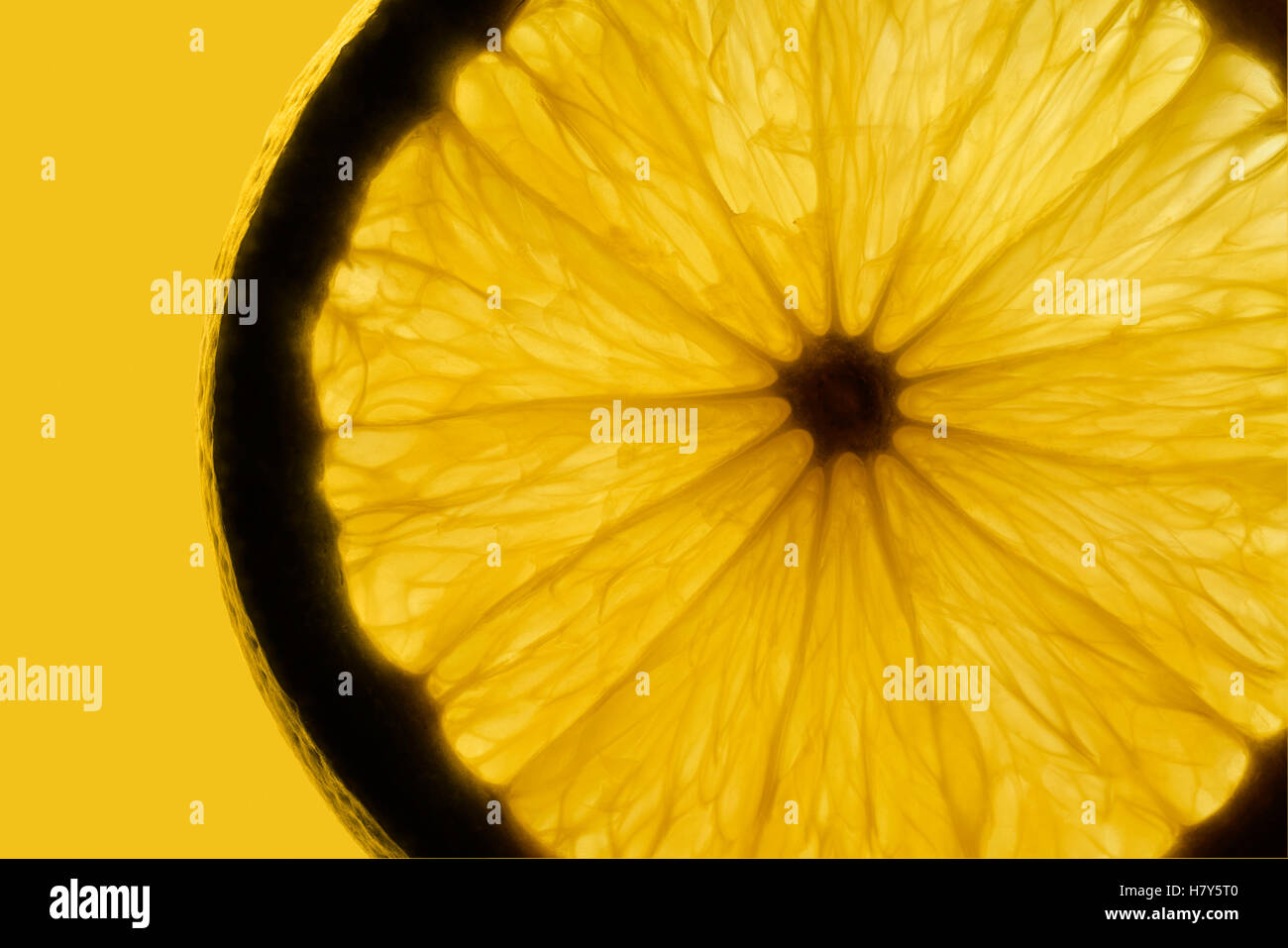 cross section detail of a orange fruit in orange back Stock Photo - Alamy