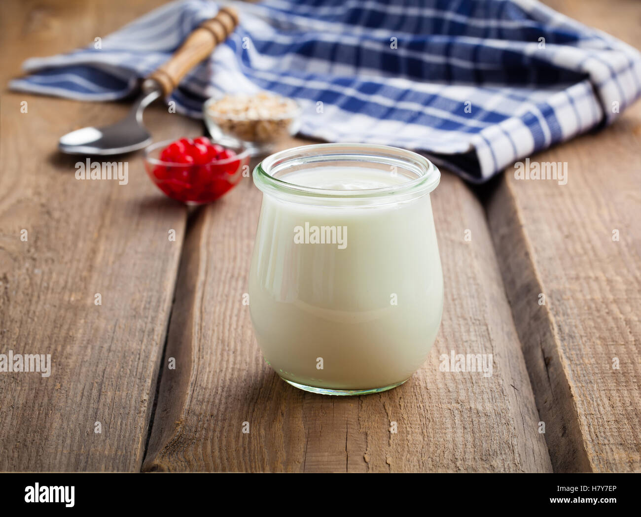 natural yoghurt on a wooden background Stock Photo - Alamy