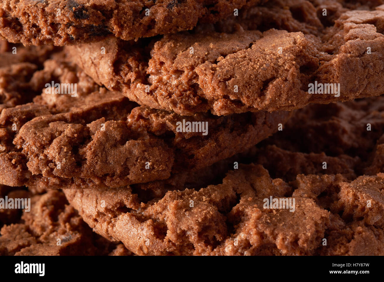 Backgrounds and textures: group of dark chocolate cookies, arranged as ...