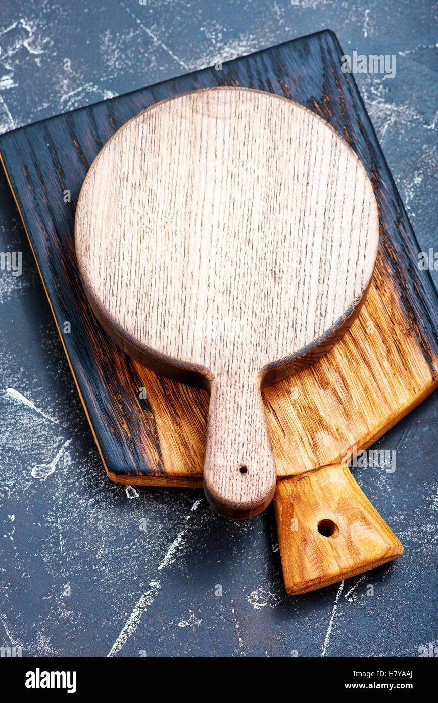 wooden board, kitchen boards on a table Stock Photo - Alamy