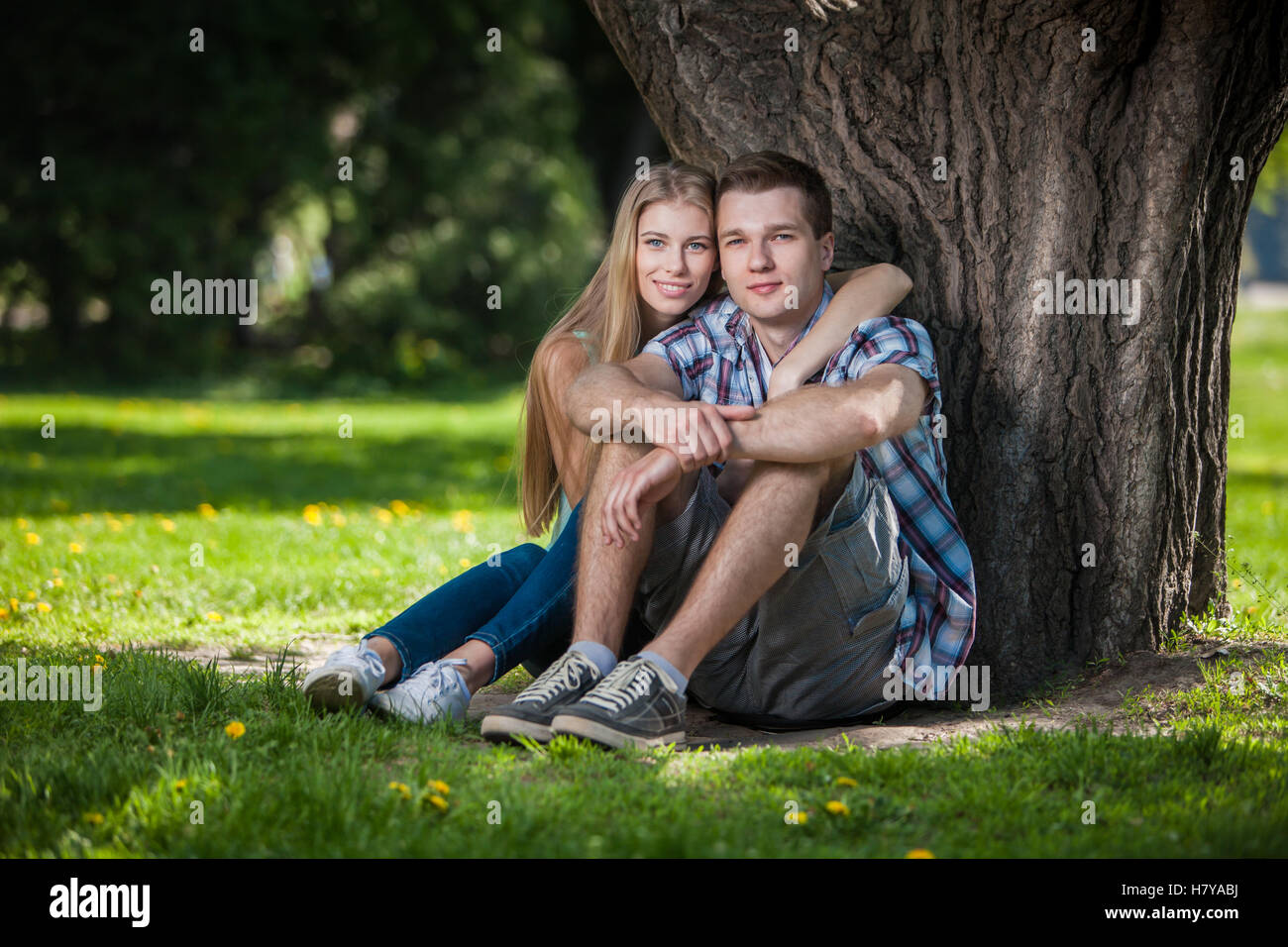 Happy young people outdoors Stock Photo - Alamy