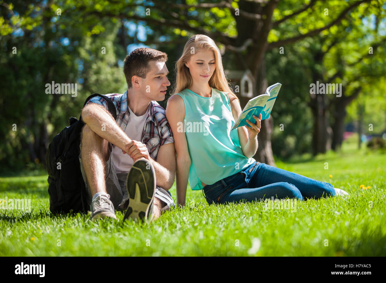 Happy young people outdoors Stock Photo - Alamy