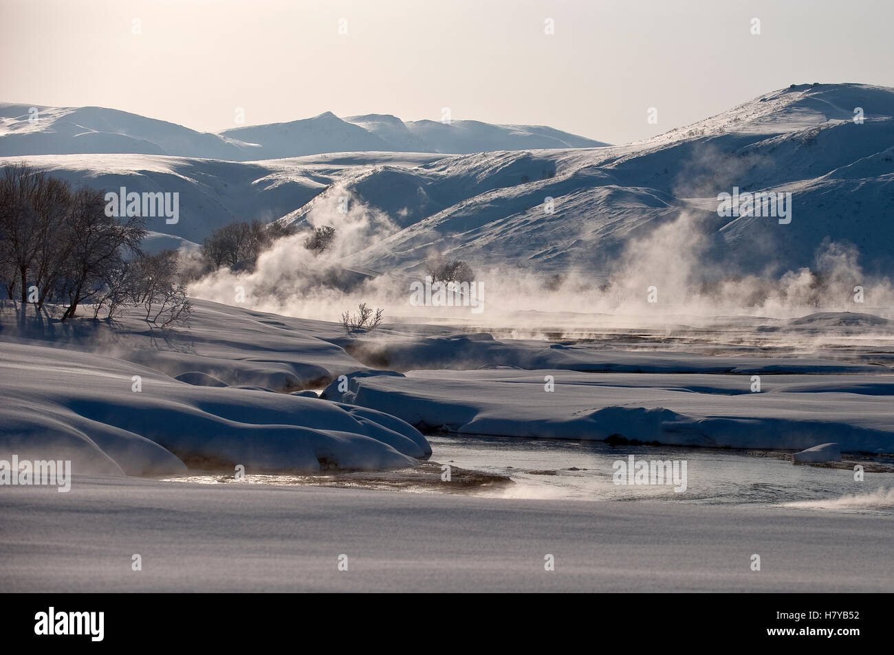 Steam coming off river in winter, Kamchatka, Russia Stock Photo - Alamy