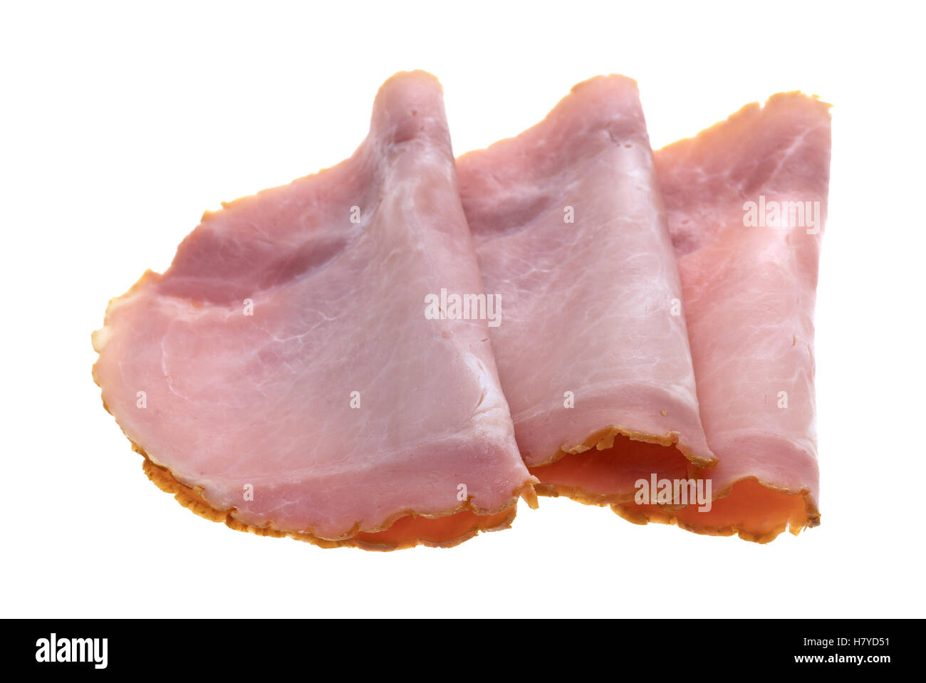 Three slices of applewood smoked ham folded in half isolated on a white ...