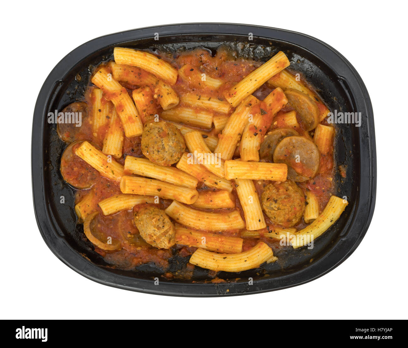 A TV dinner of rigatoni pasta with sausage and meatballs in a marinara ...