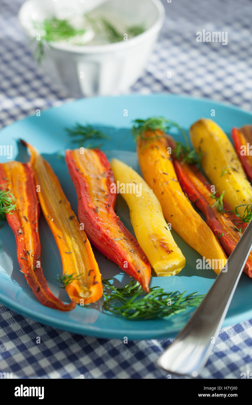 roasted colorful carrots on plate Stock Photo - Alamy