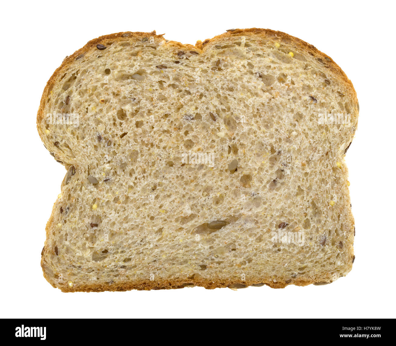 A slice of nine grain whole wheat bread isolated on a white background ...