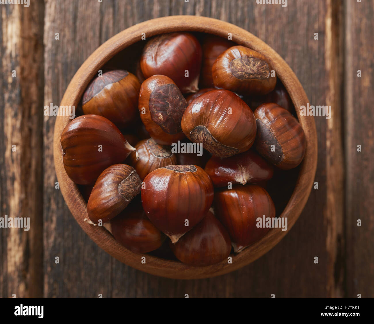 Chestnuts in wooden bowl Stock Photo - Alamy