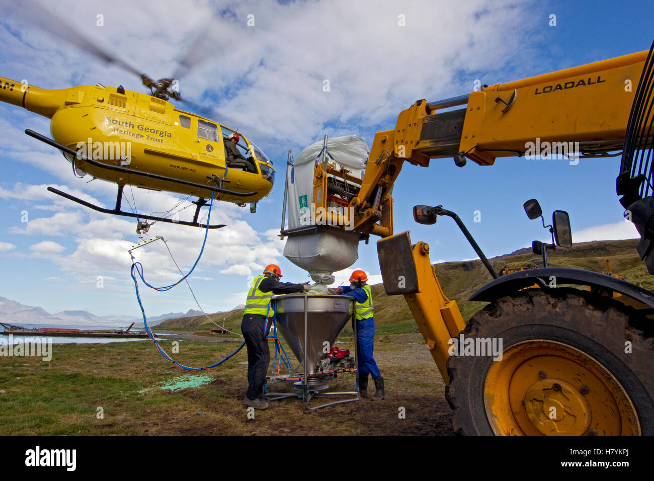 Helicopter bucket being filled with bait for South Georgia Heritage ...