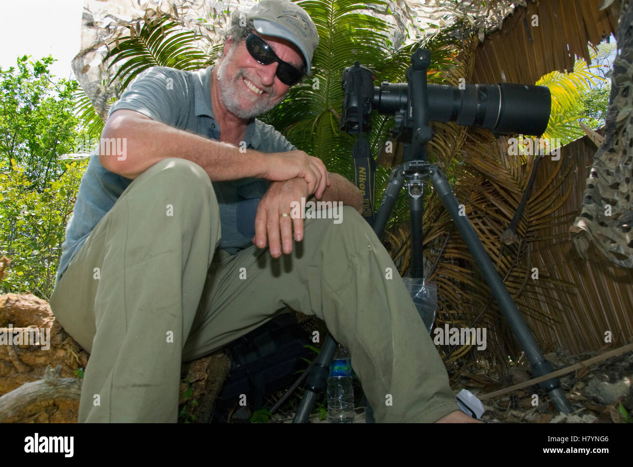 Photographer Kevin Schafer in blind, central Sulawesi, Indonesia Stock ...
