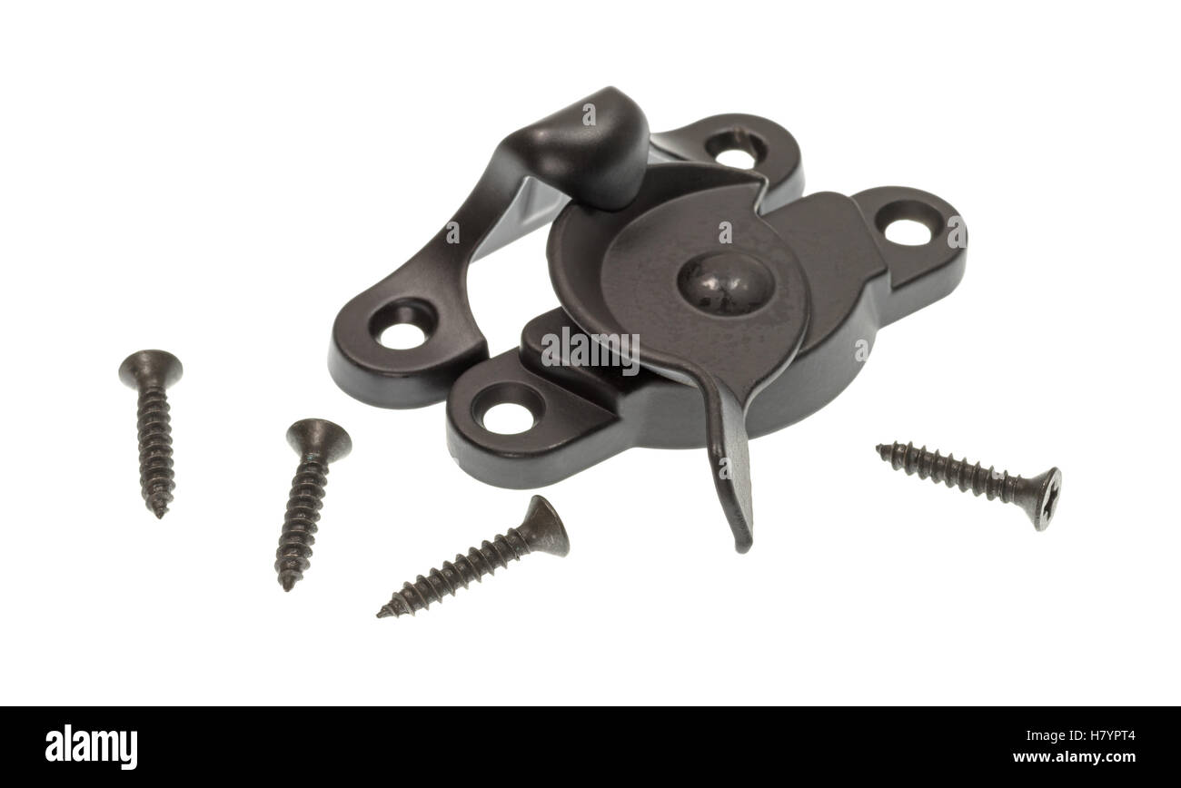 Window sash lock with screws on a white background Stock Photo - Alamy