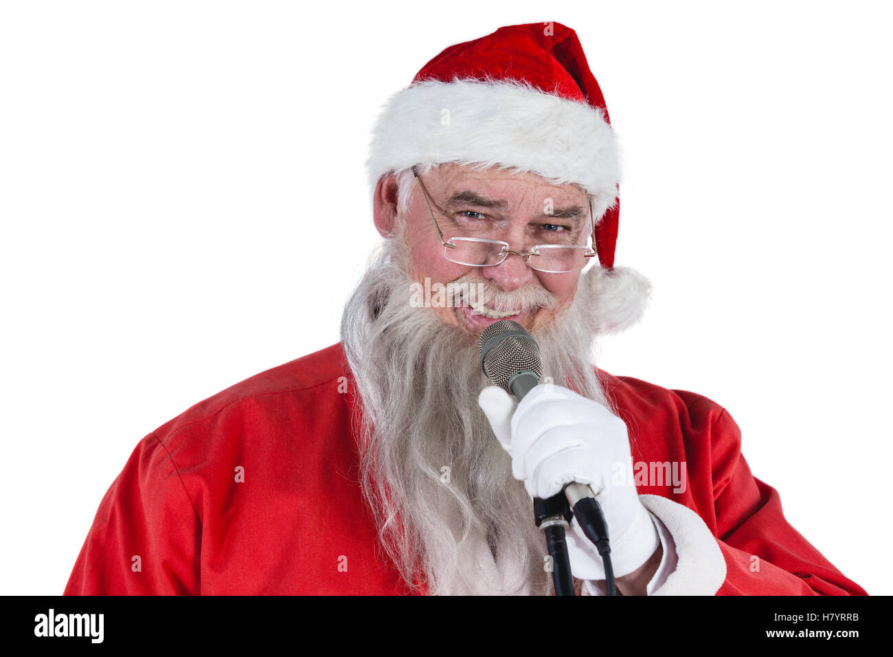 Santa claus singing a christmas songs Stock Photo - Alamy