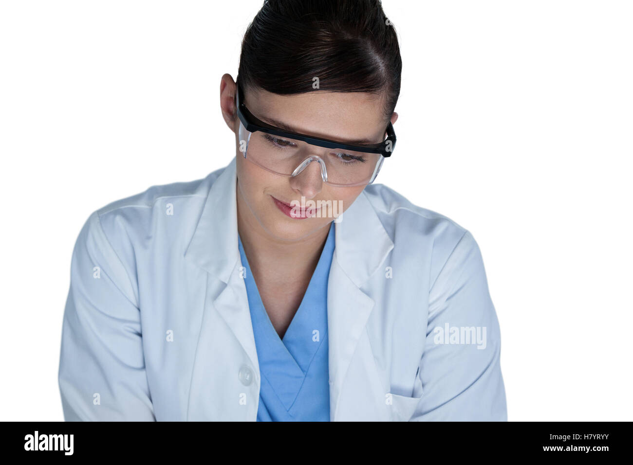Female scientist smiling against white background Stock Photo - Alamy