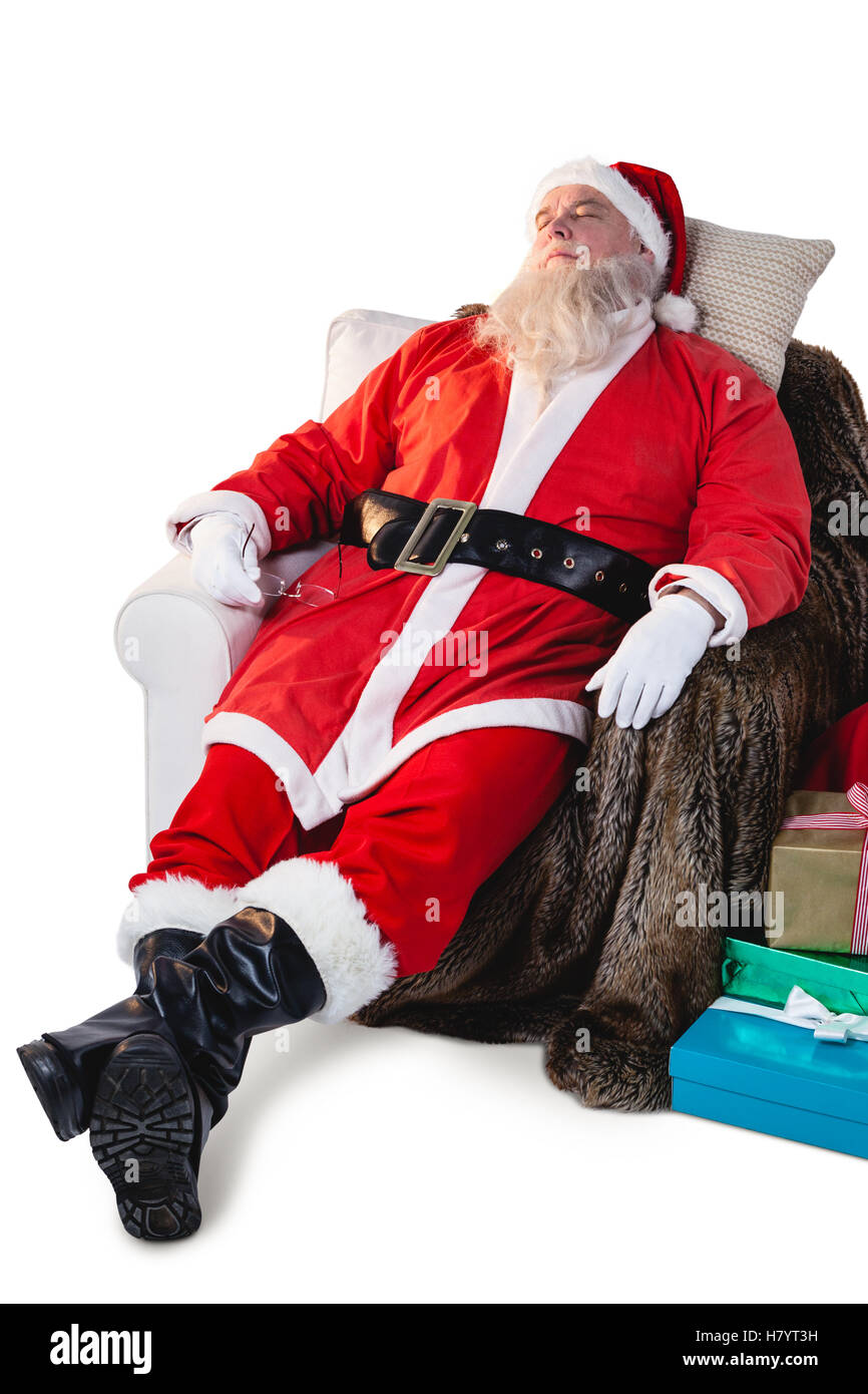 Santa claus relaxing on sofa Stock Photo - Alamy