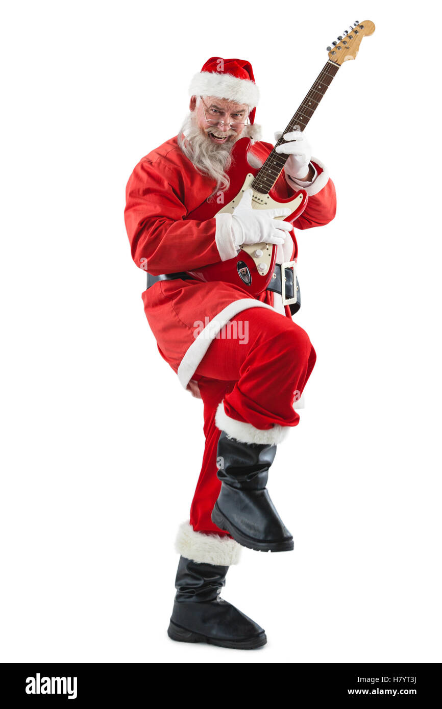 Smiling santa claus playing a guitar Stock Photo - Alamy