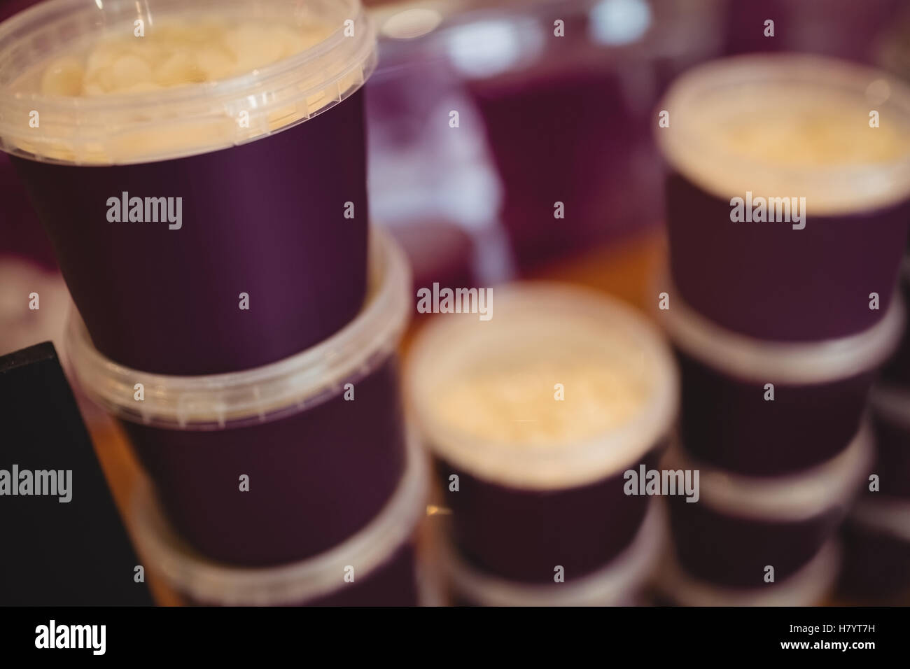 Stacked chocolate containers in display Stock Photo - Alamy