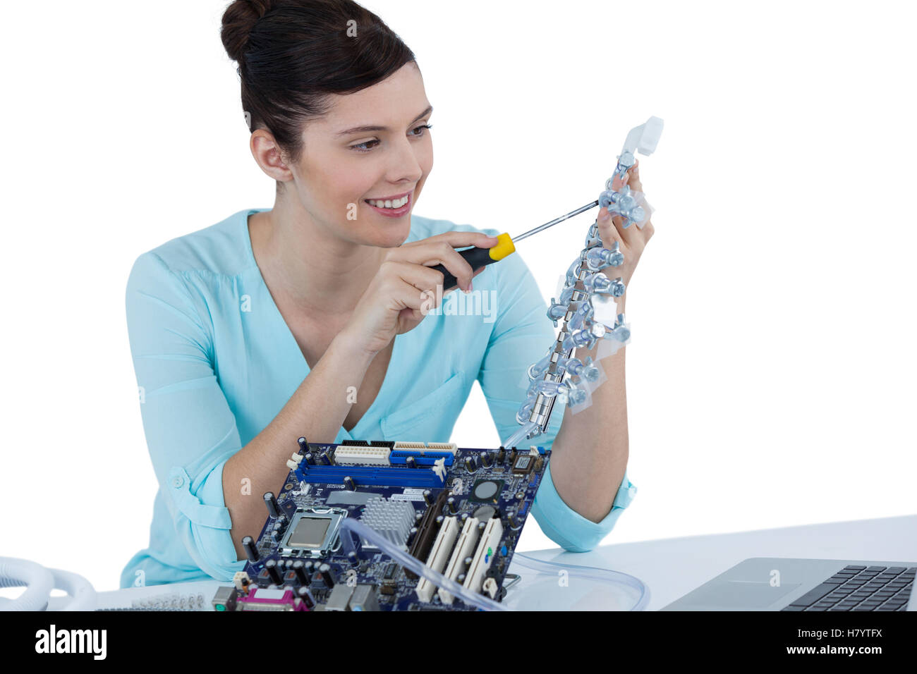 Female computer engineer repairing computer motherboard Stock Photo - Alamy