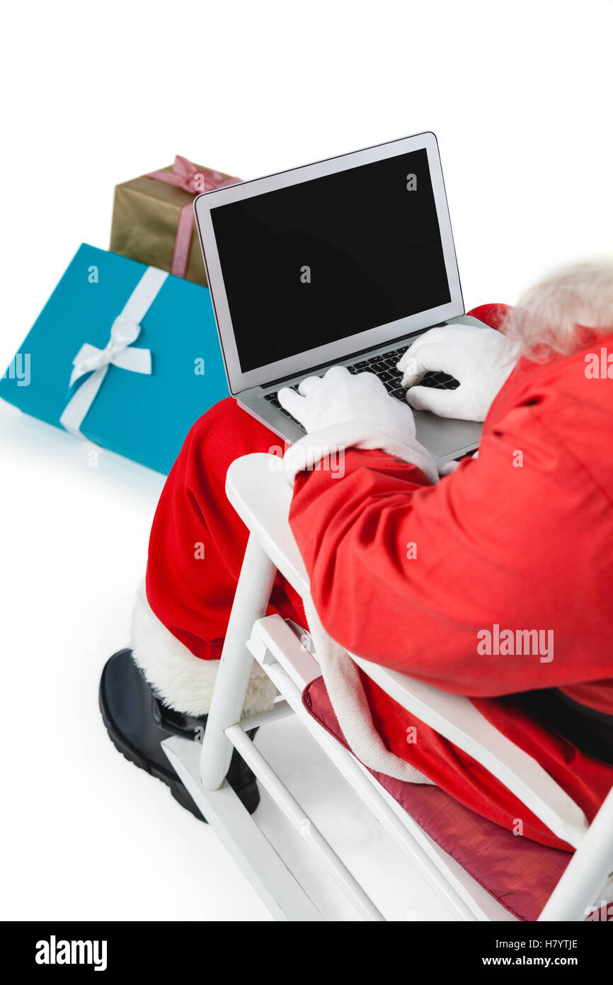 Santa claus using laptop computer hi-res stock photography and images ...