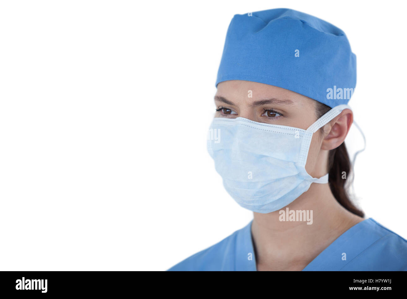 Female surgeon standing against white background Stock Photo - Alamy
