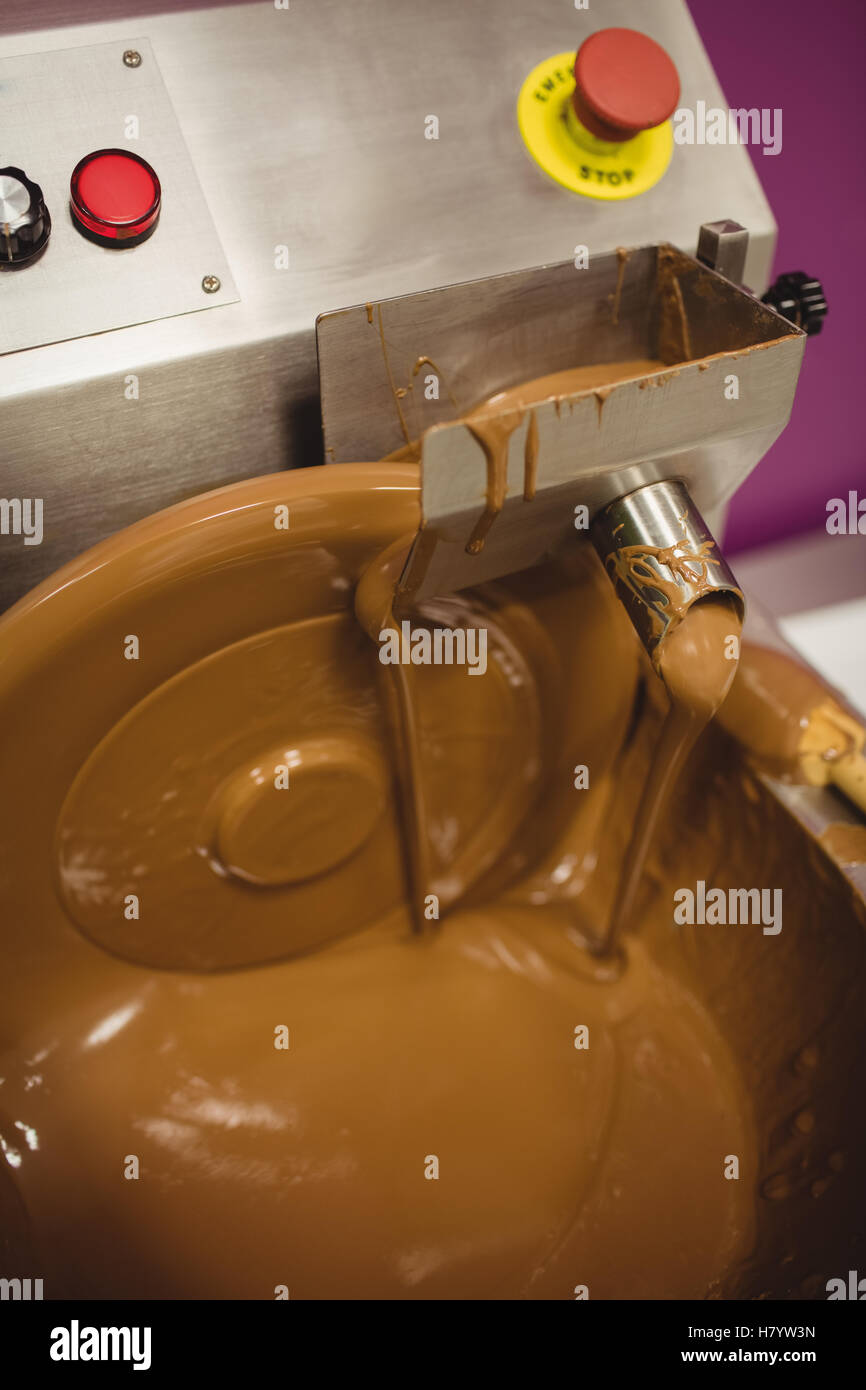 Close-up of chocolate blending machine Stock Photo - Alamy