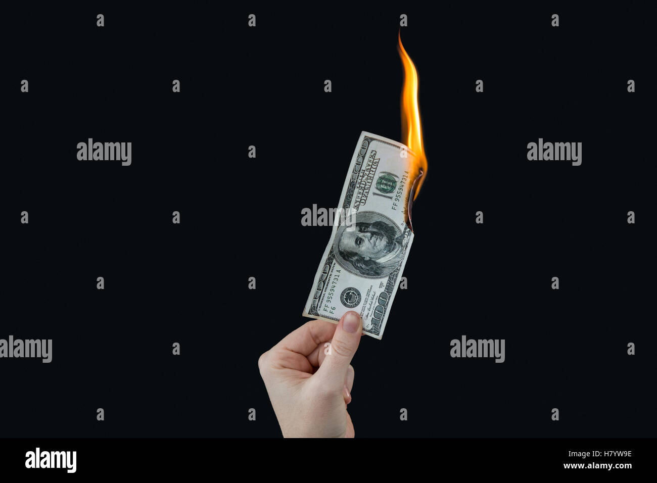 Burning dollar bill hi-res stock photography and images - Alamy