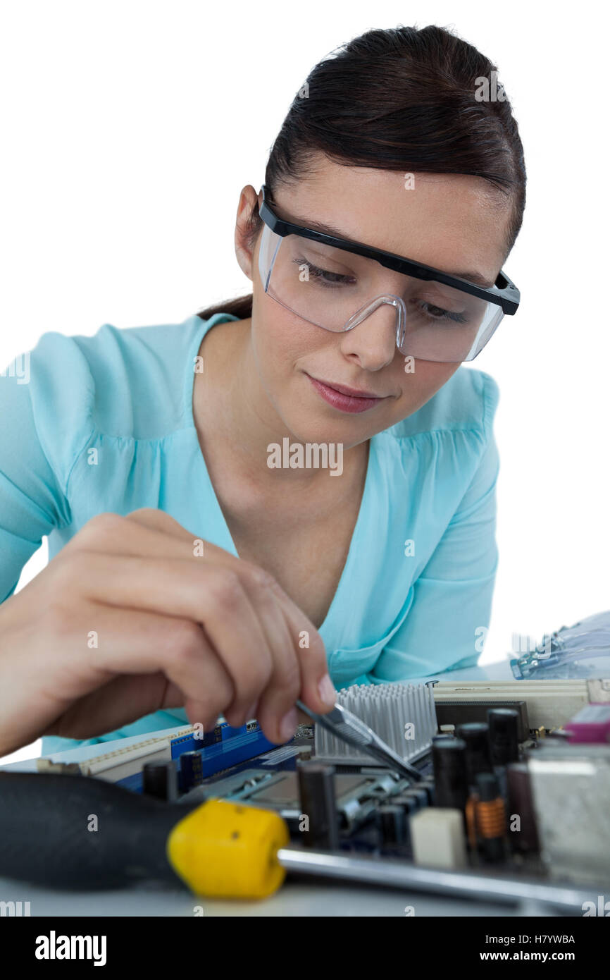 Female computer engineer repairing computer motherboard Stock Photo - Alamy