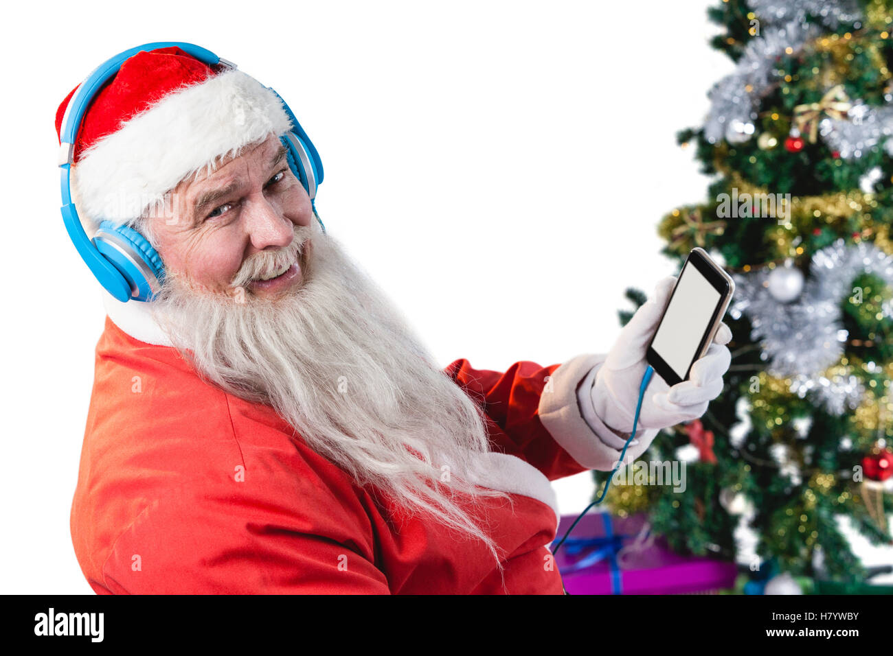 Santa claus smartphone christmas tree hi-res stock photography and ...