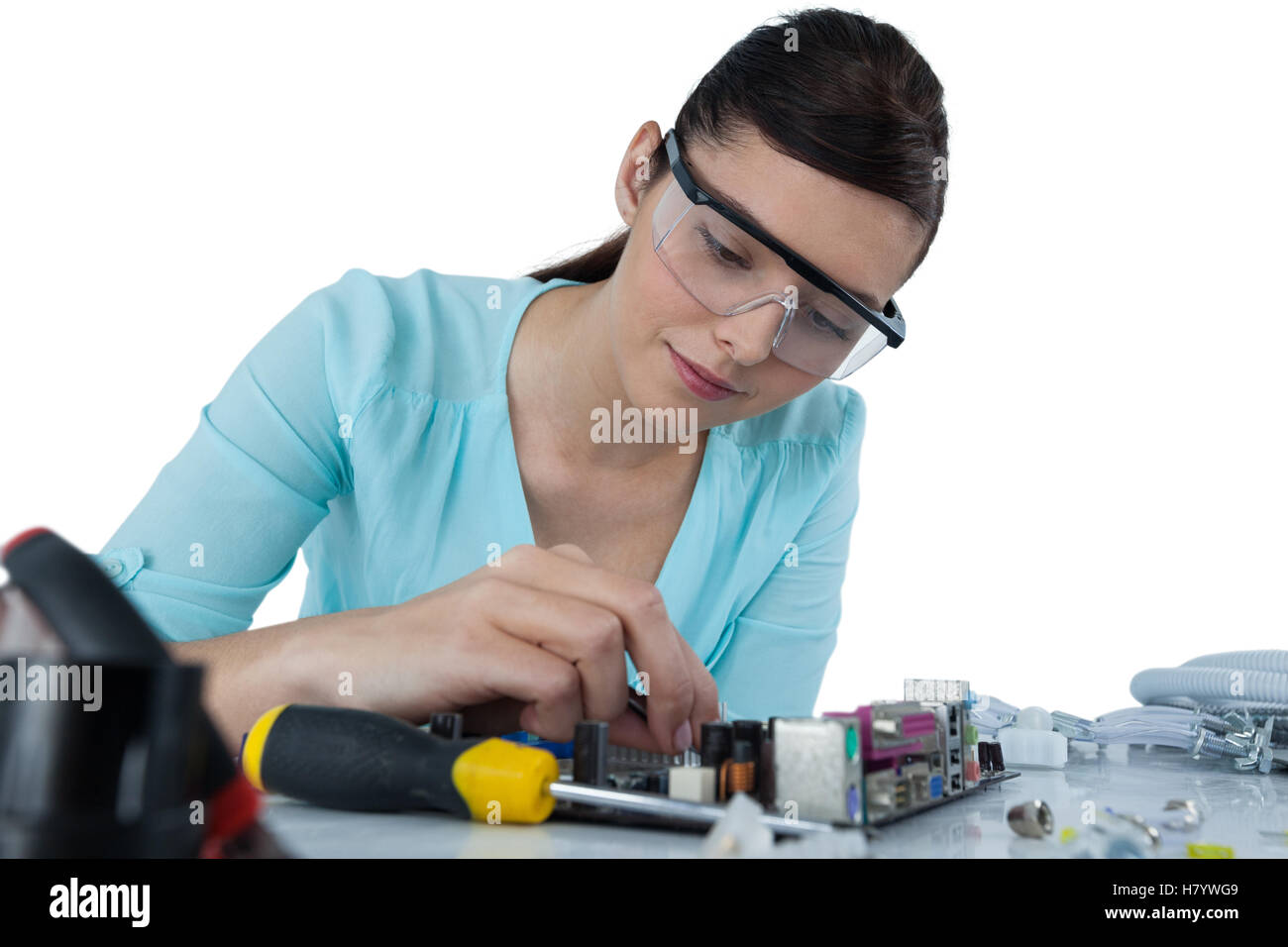 Female computer engineer repairing computer motherboard Stock Photo - Alamy