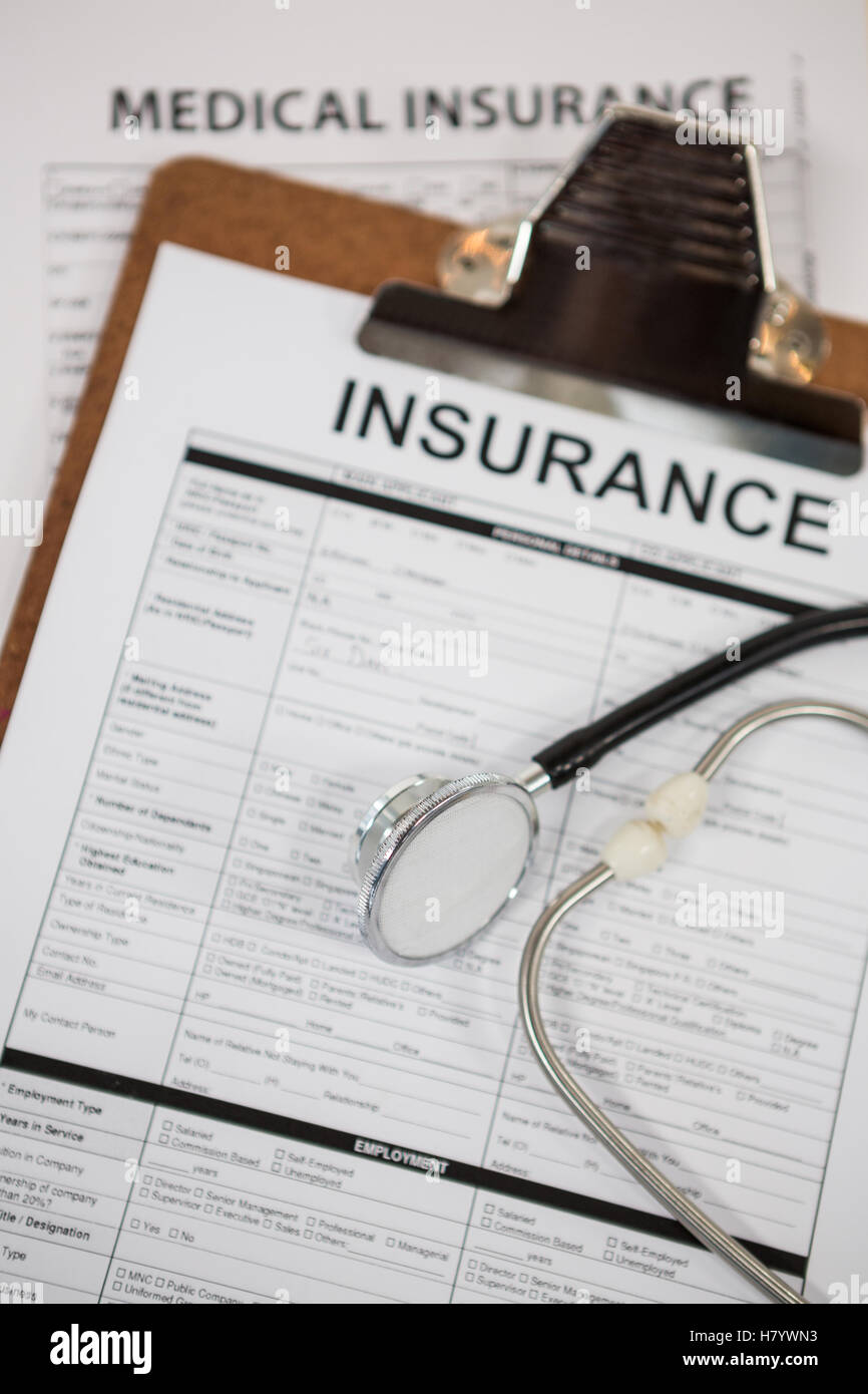 Clipboard with medical insurance paper and stethoscope Stock Photo - Alamy