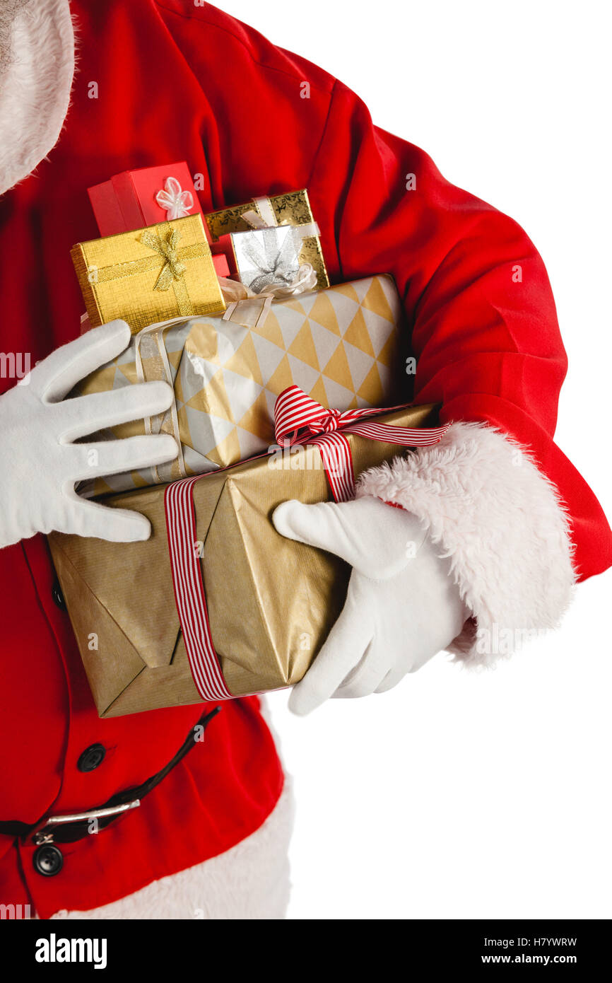 Santa claus holding a presents Stock Photo - Alamy