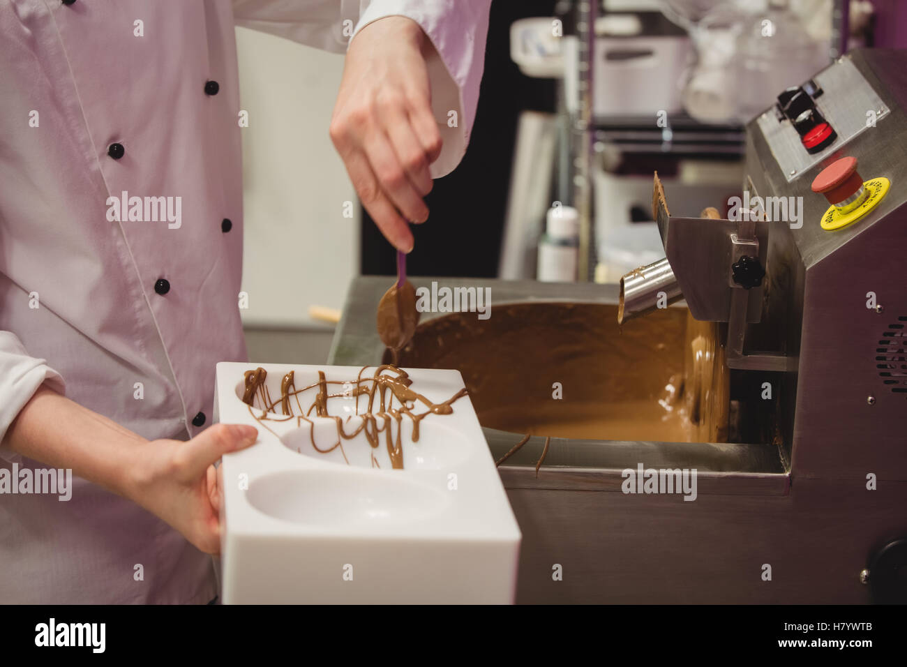 Chocolate factory mixing hi-res stock photography and images - Alamy