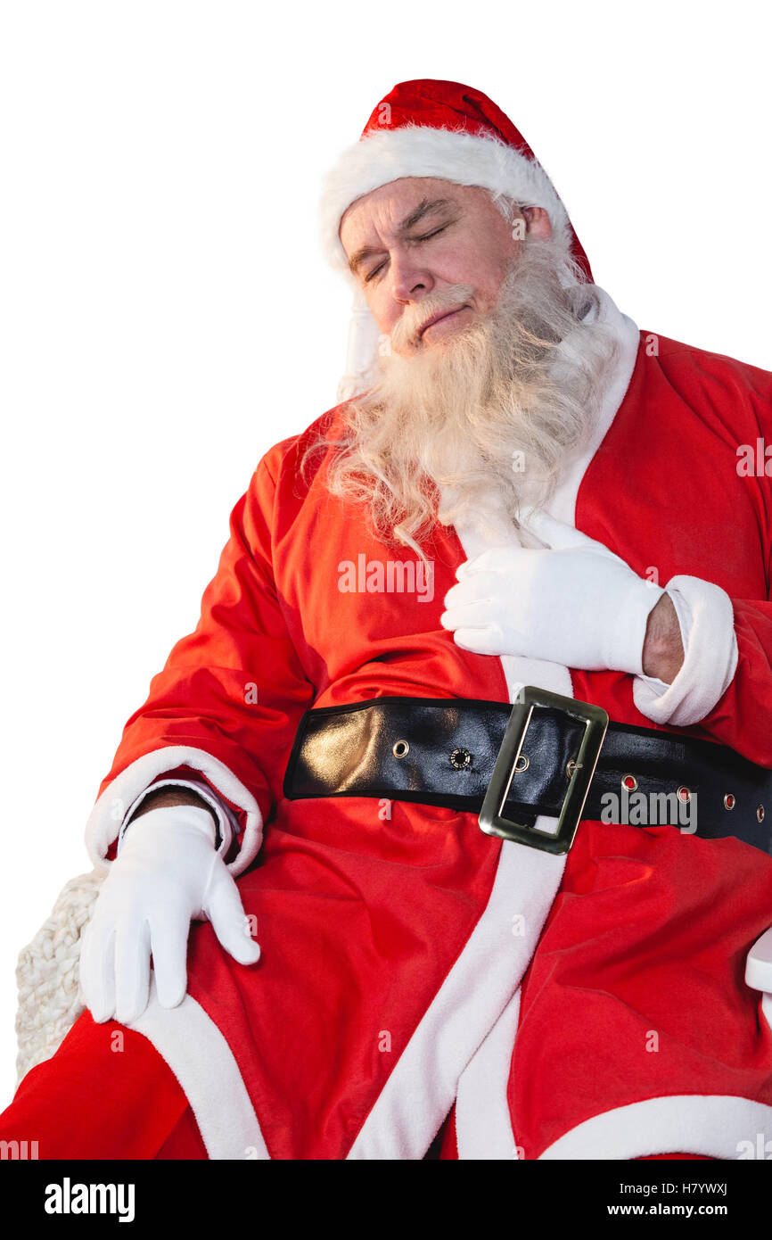 Santa claus relaxing on chair Stock Photo - Alamy