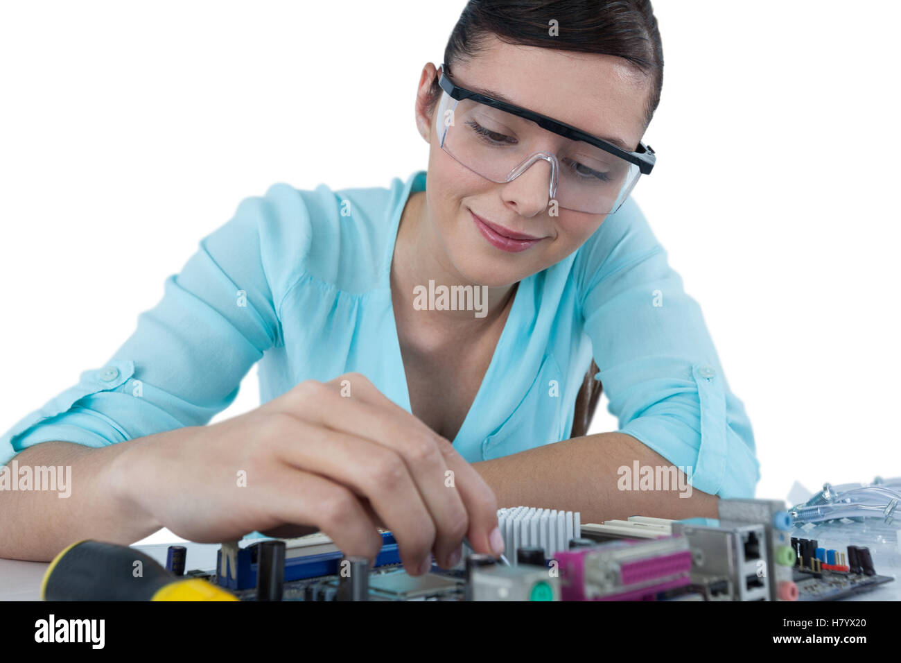 Female computer engineer repairing computer motherboard Stock Photo - Alamy