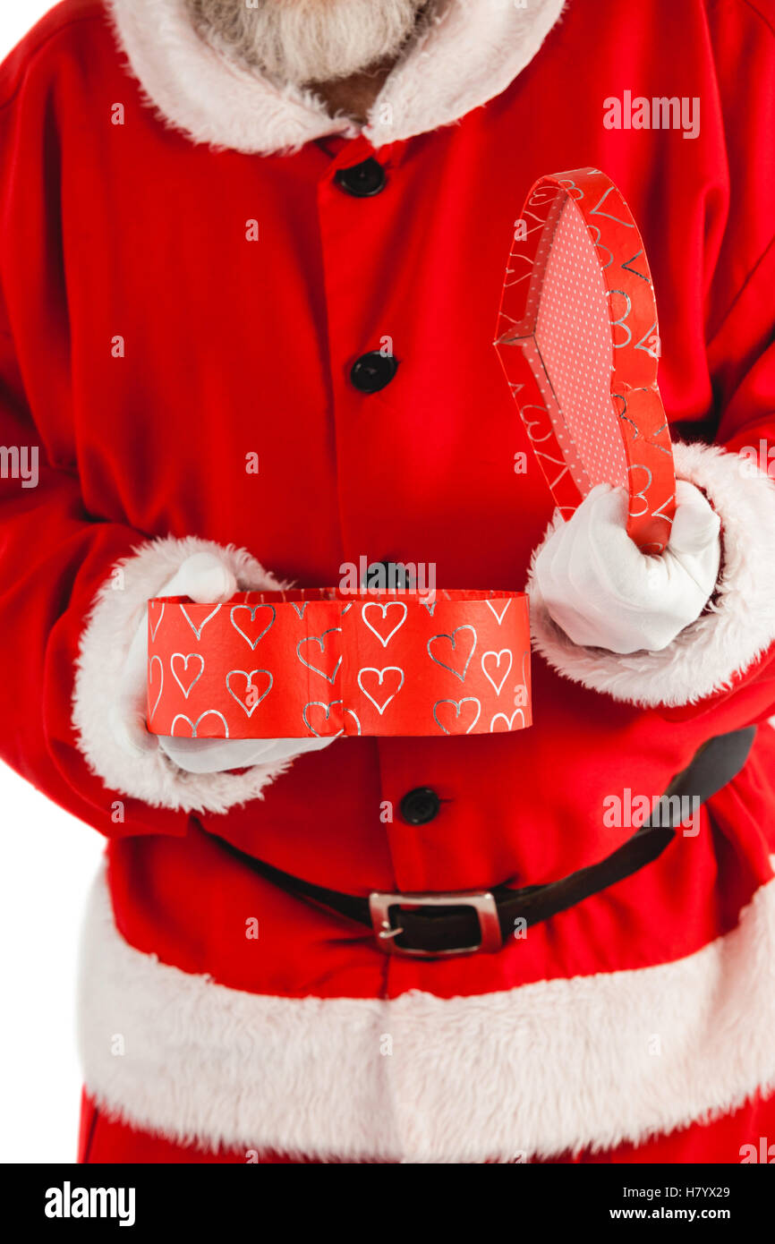 Santa claus opening a gift box Stock Photo - Alamy