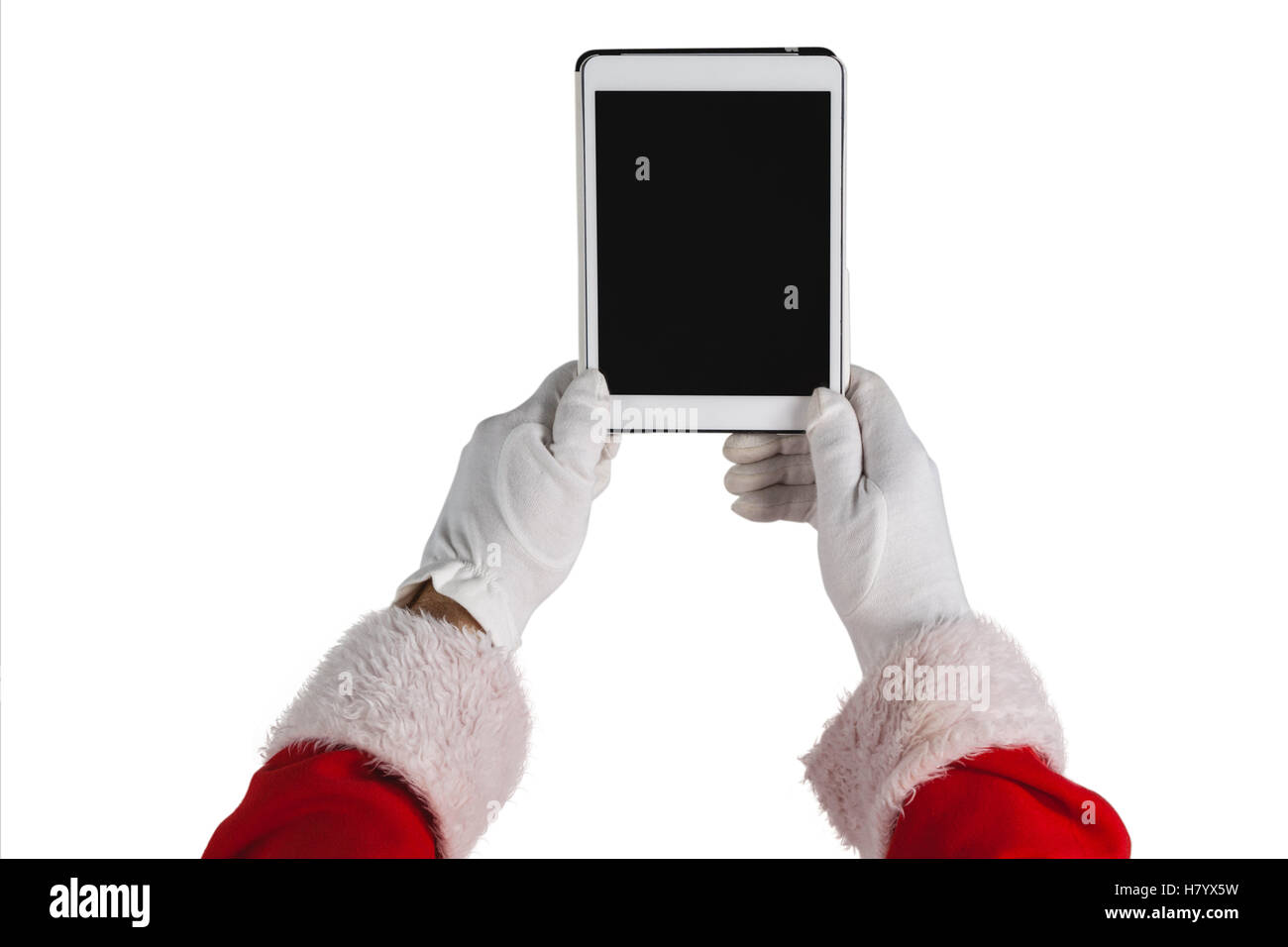 Santa claus holding digital tablet Stock Photo - Alamy