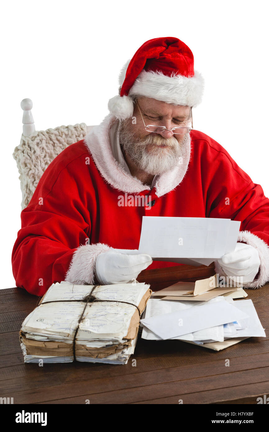 Santa reading letter hi-res stock photography and images - Alamy