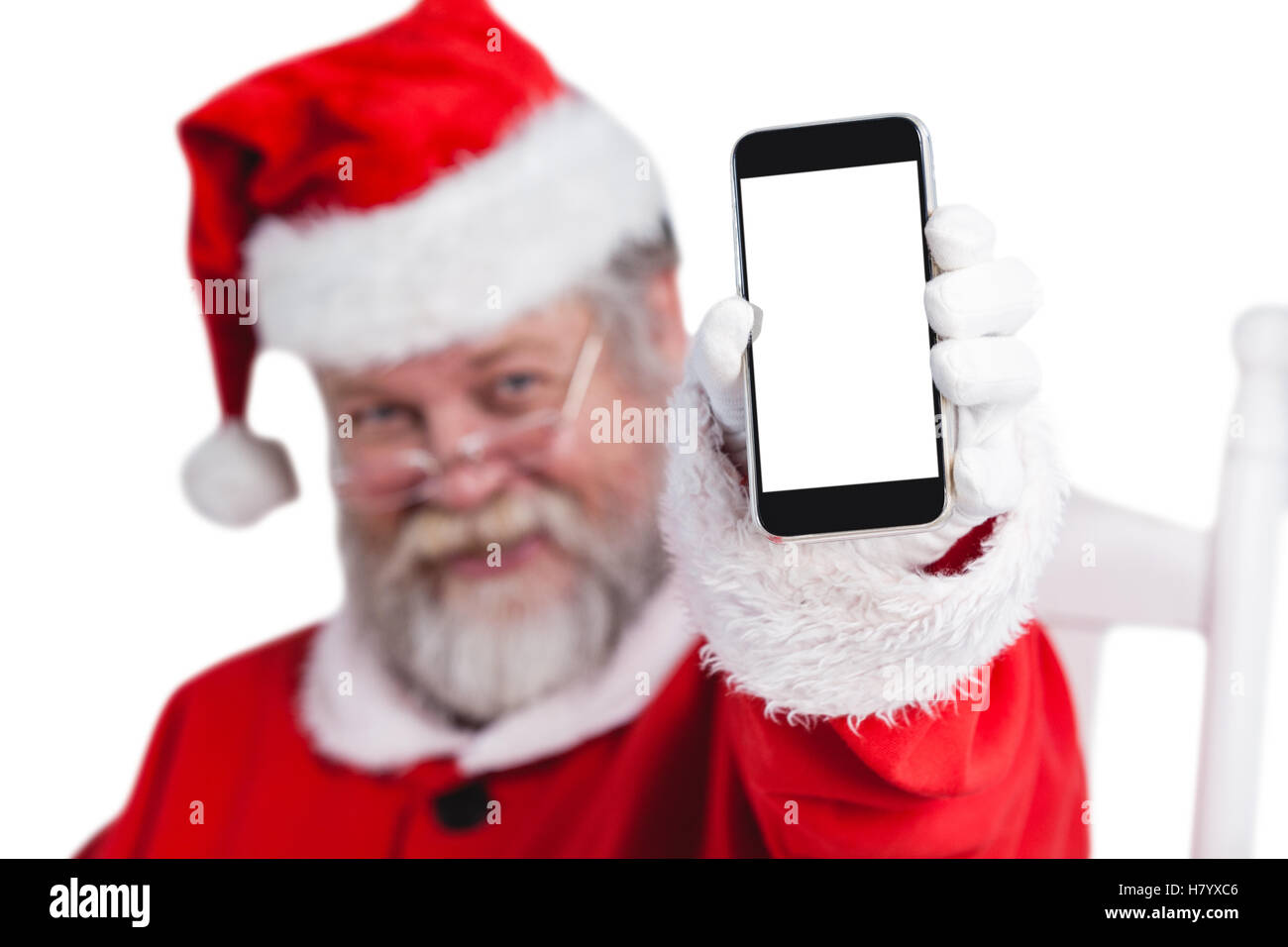 Santa holding phone hi-res stock photography and images - Alamy