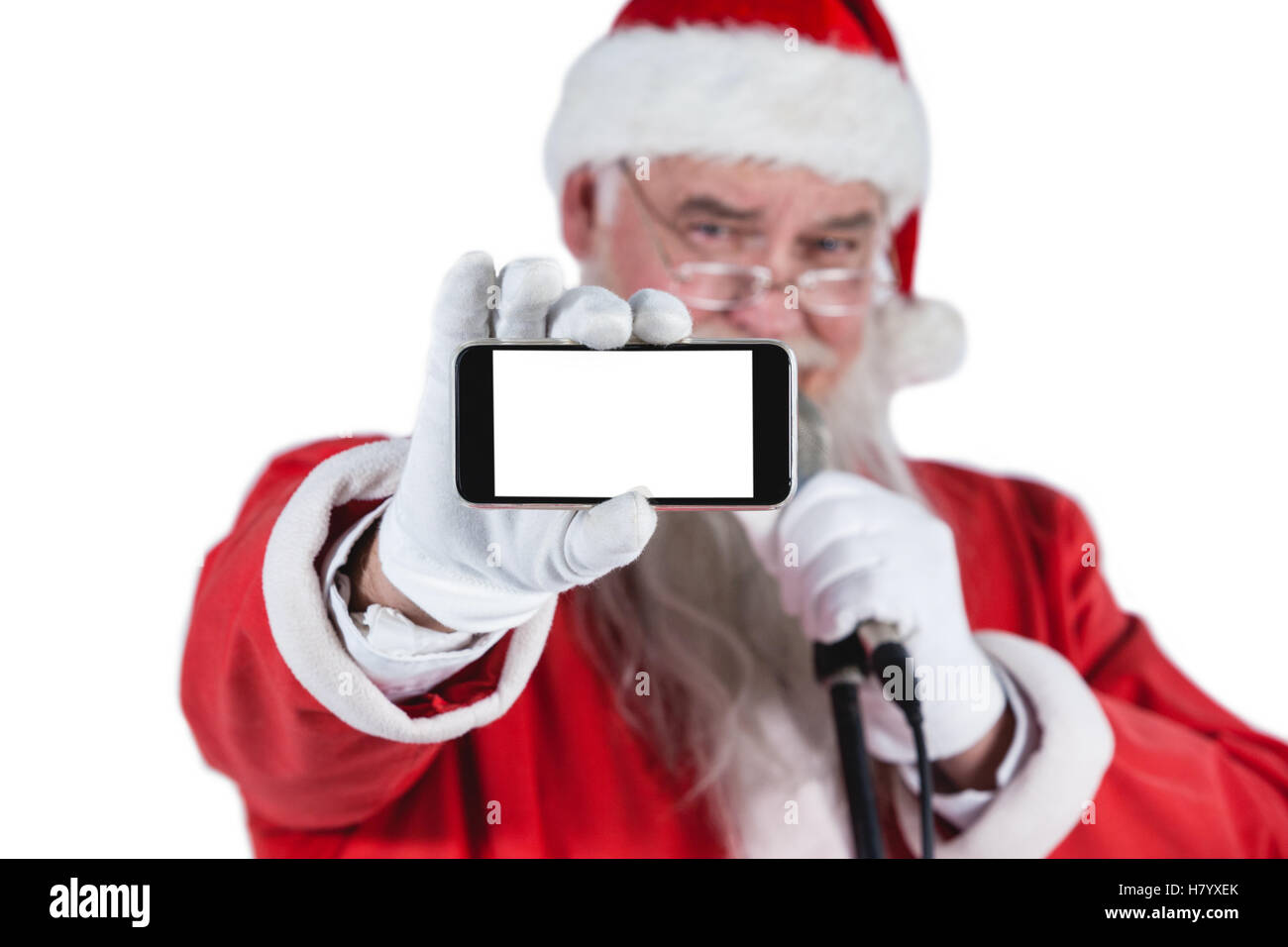 Santa claus showing mobile phone Stock Photo - Alamy