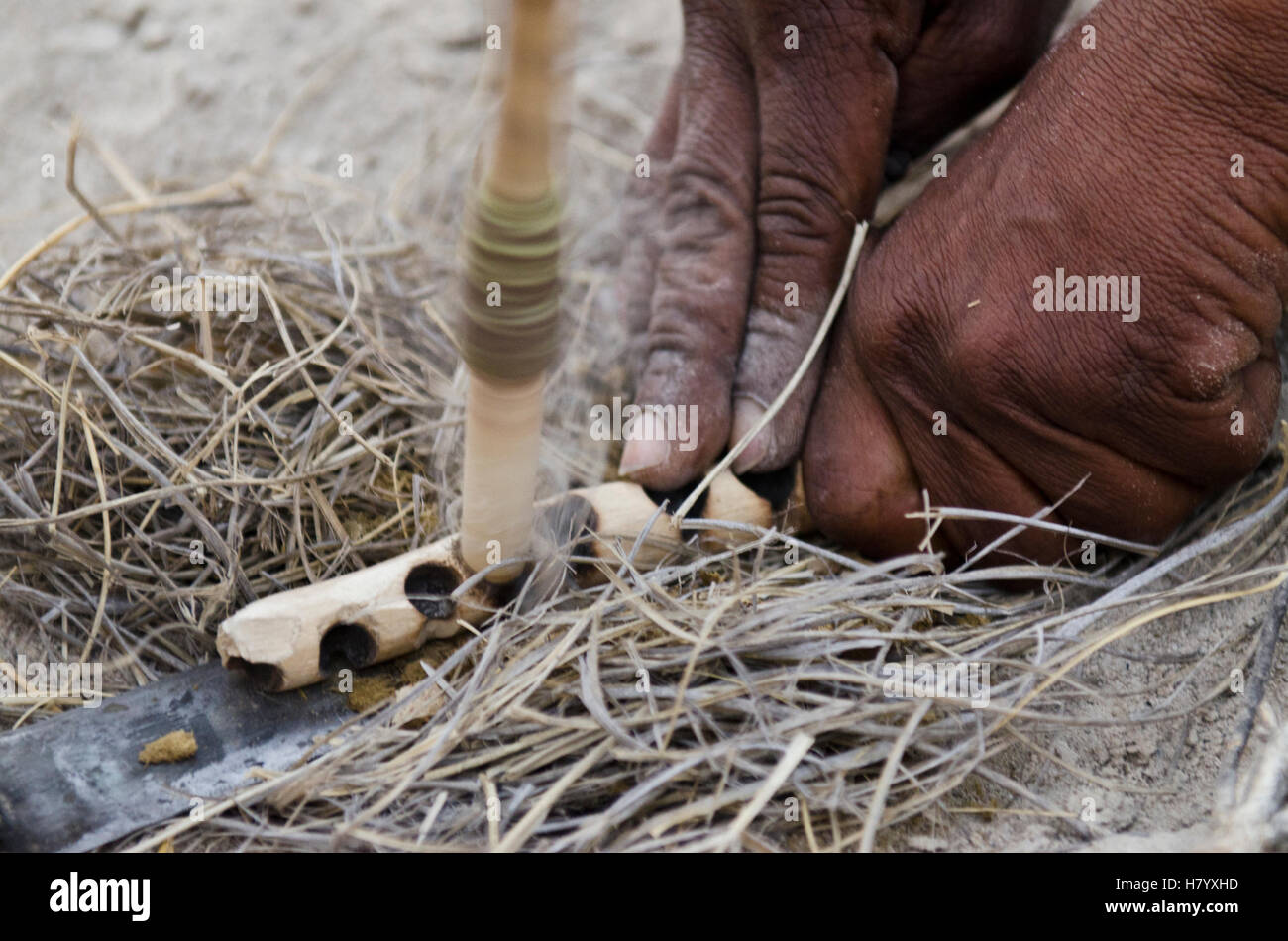 Kalahari bushmen making fire, Makgadikgadi Pans, Kalahari Desert ...