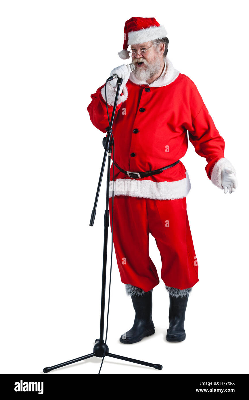 Santa claus singing a christmas songs Stock Photo - Alamy