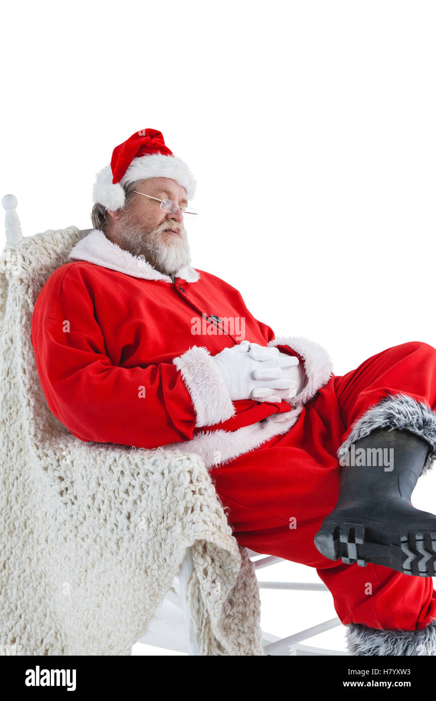 Santa claus relaxing on sofa Stock Photo - Alamy