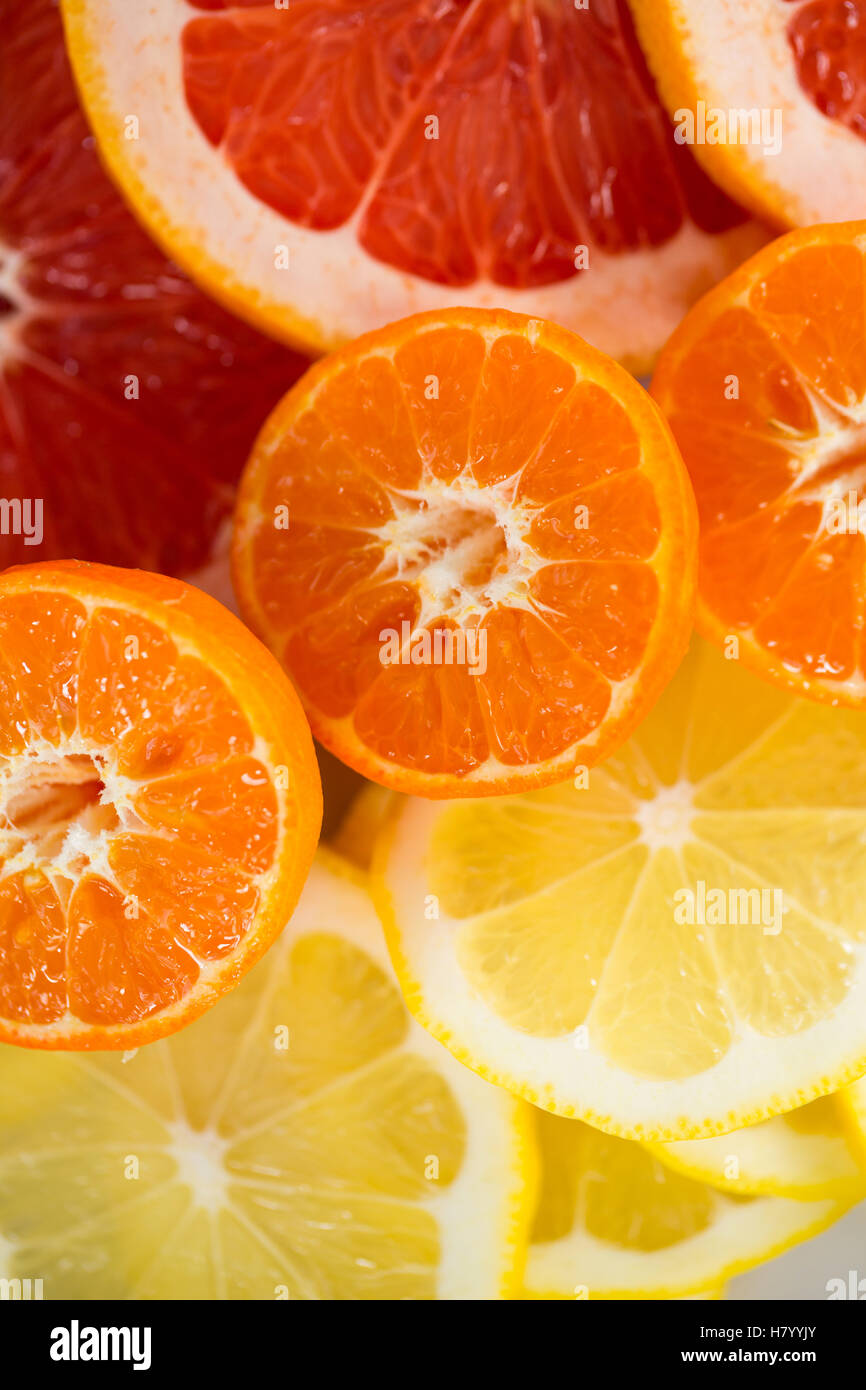 Close-up of sliced lemons, blood orange, orange Stock Photo - Alamy