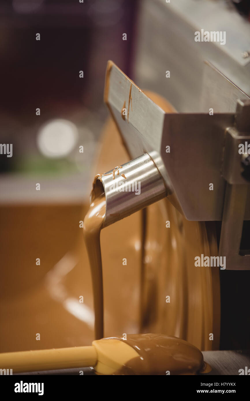 Close-up of chocolate blending machine Stock Photo - Alamy